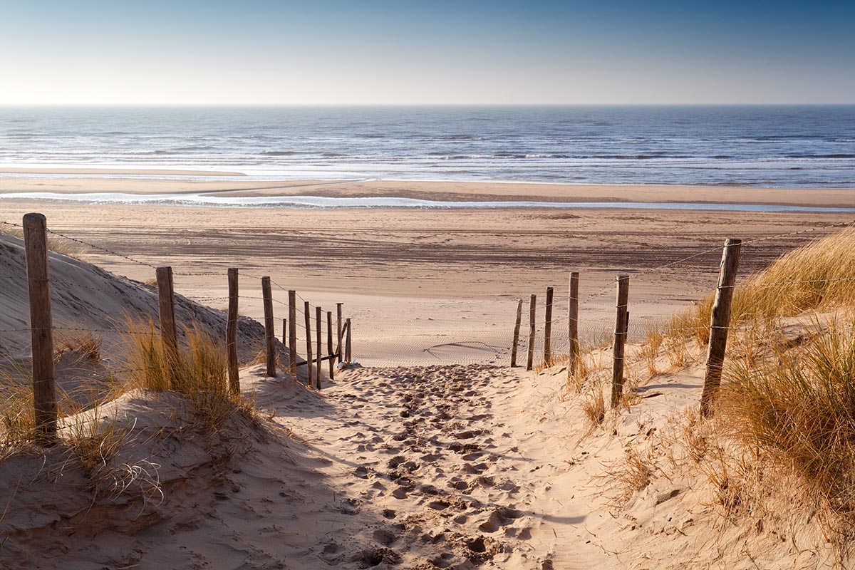 Fotobehang Strand: Fotobehang strandopgang